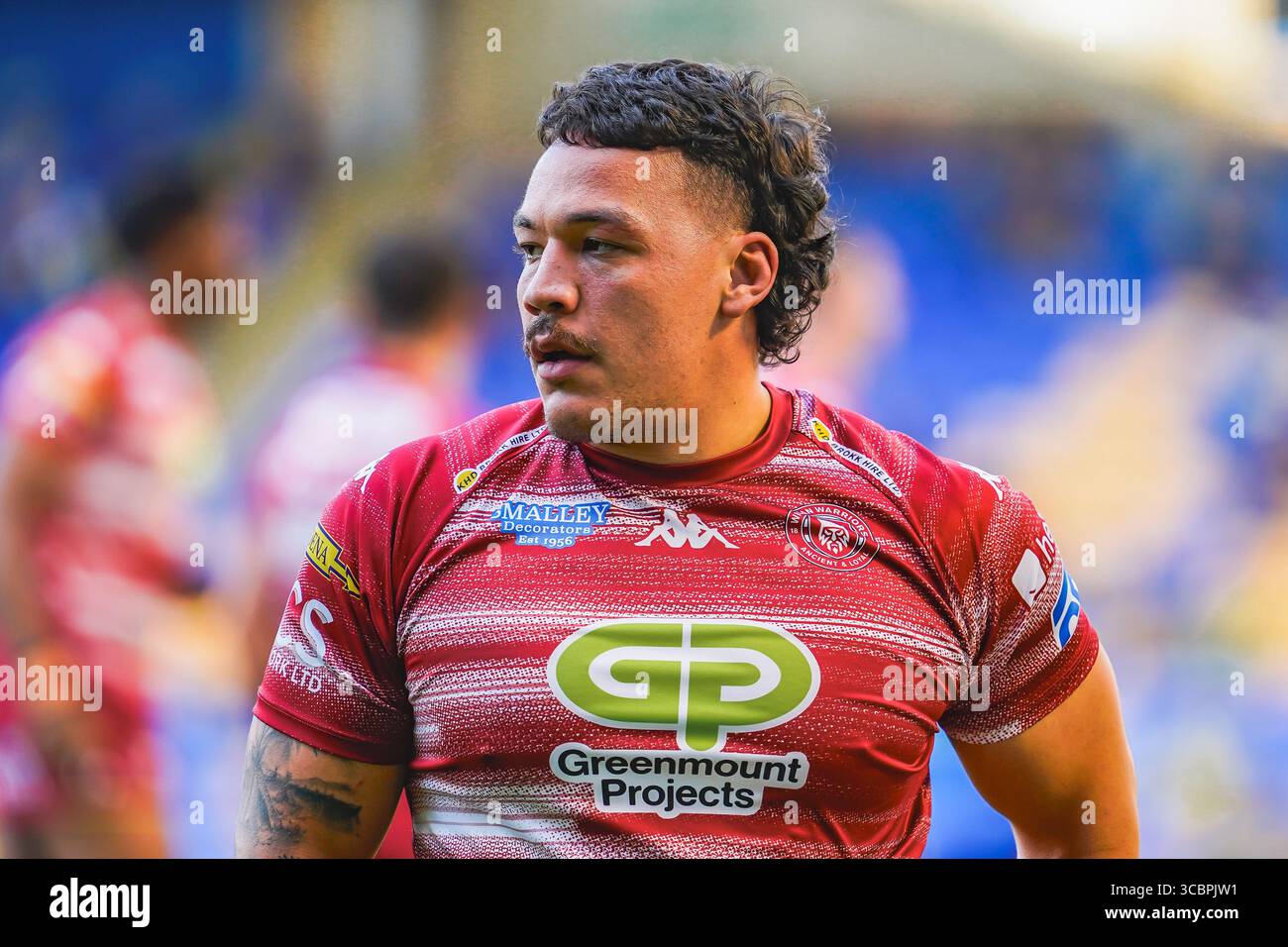 WARRINGTON, ENGLAND - August 8: Tyler Dupree of Wigan Warriors pre game ...
