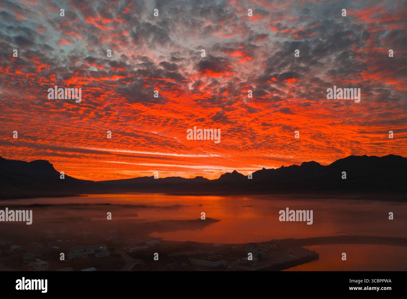 Aerial View of Sunset Over Icelandic Landscape With Mountains and Water ...