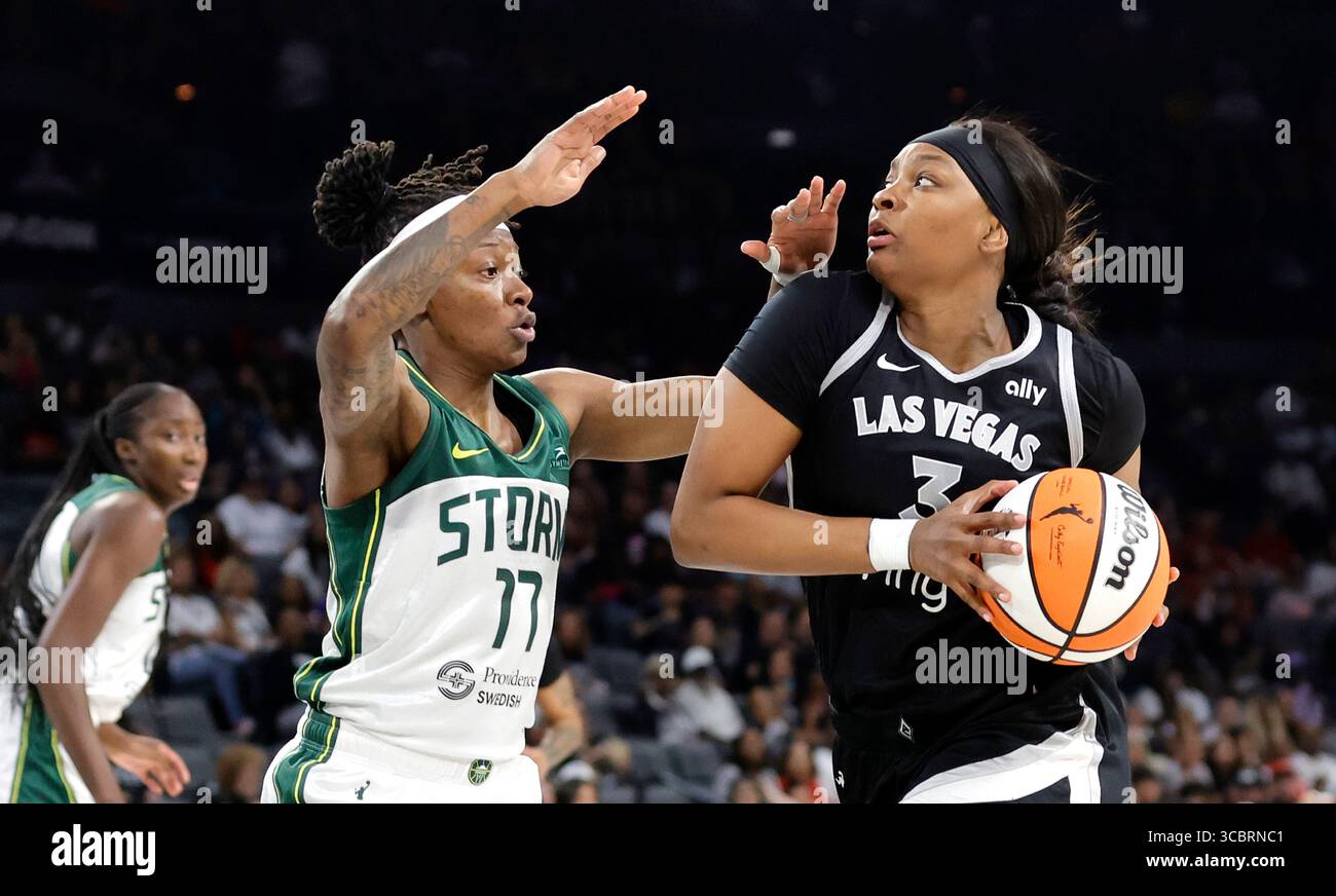 Seattle Storm guard Erica Wheeler (17) defends against Las Vegas Aces forward NaLyssa Smith (3 ...