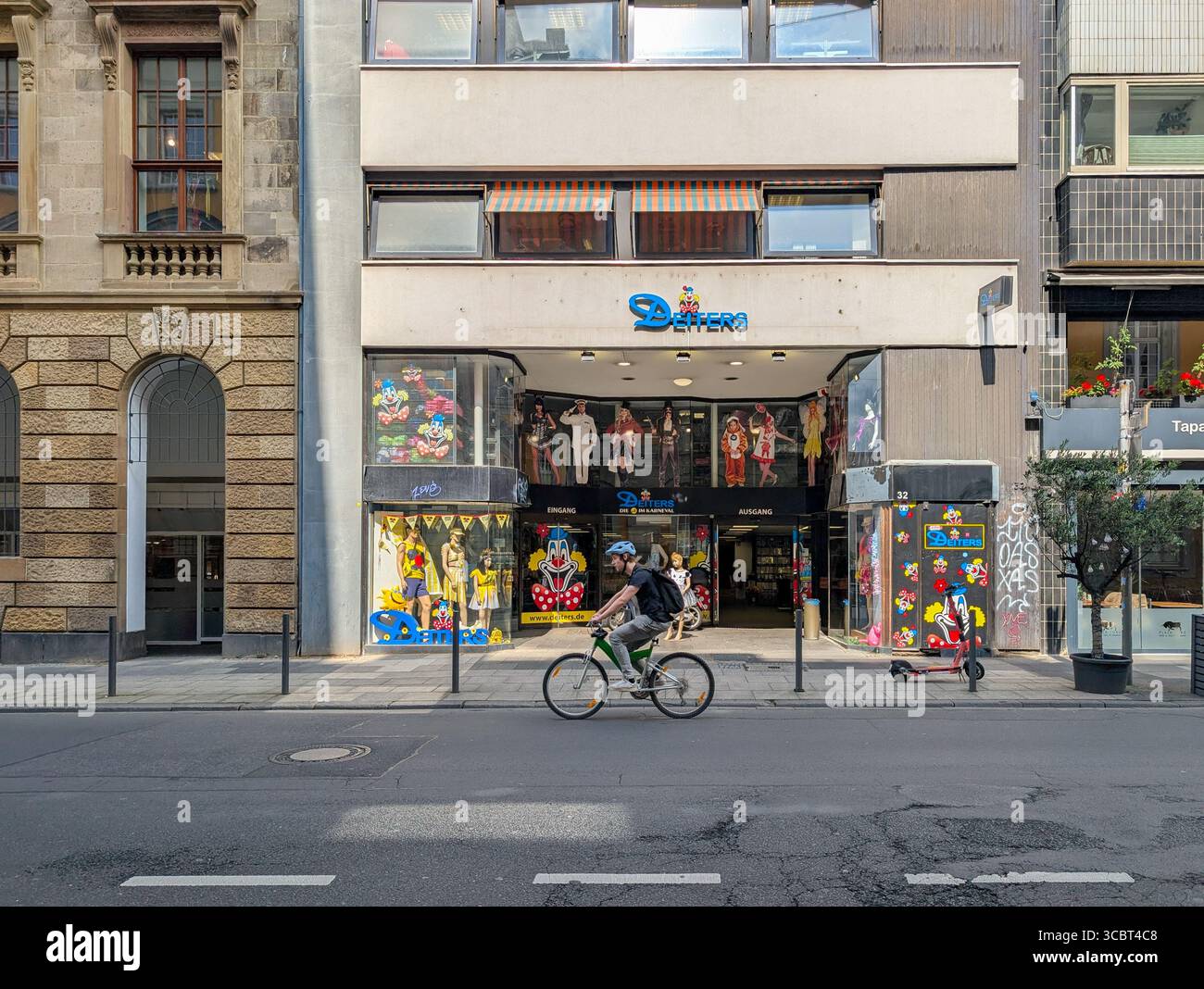 The storefront of the Deiters Store in Bonn displays a wide range of Carnival costumes and ...