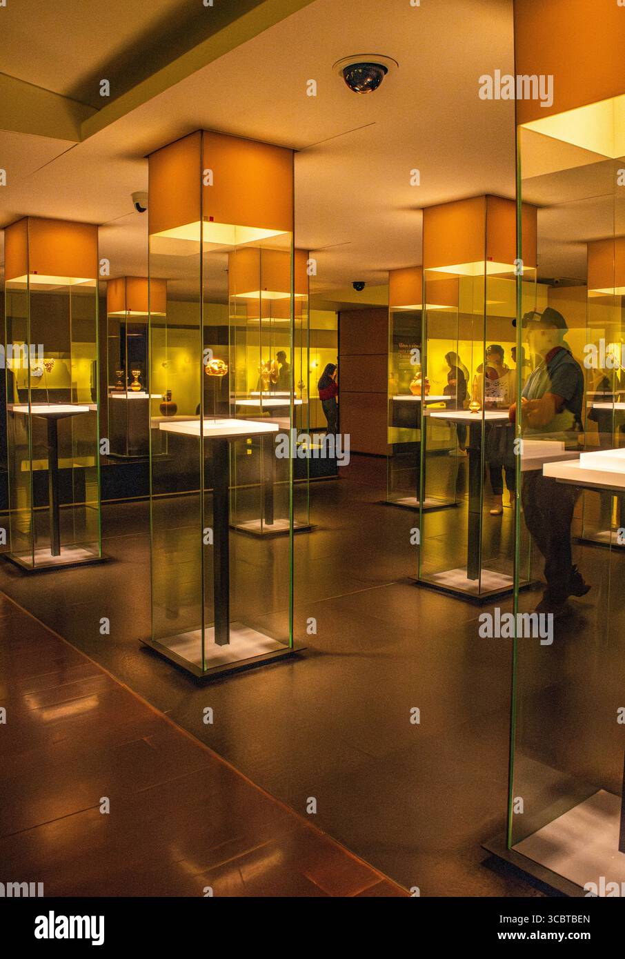 Visitors admire the stunning pre-Columbian gold artifacts in the Gold ...