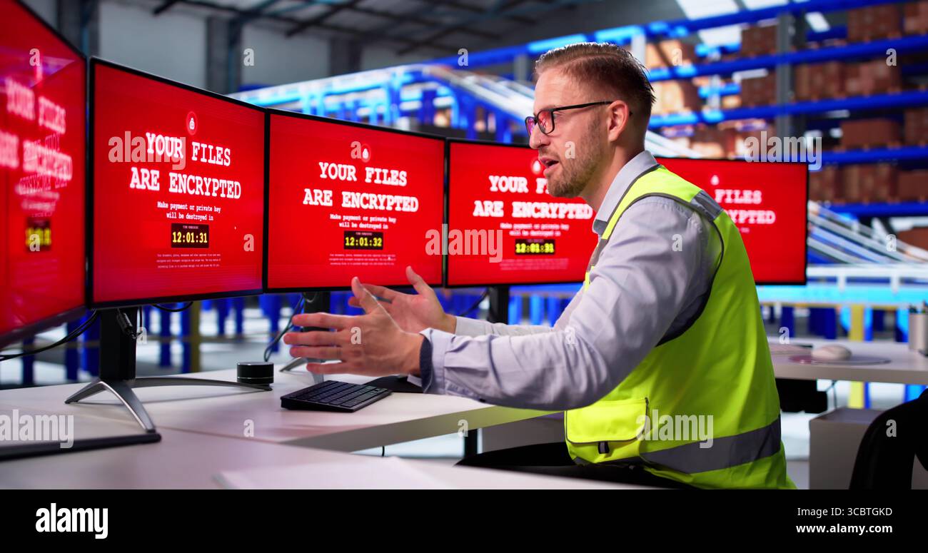 Confused Man Faces Screen In Warehouse Industry Cyber Attack Breach ...