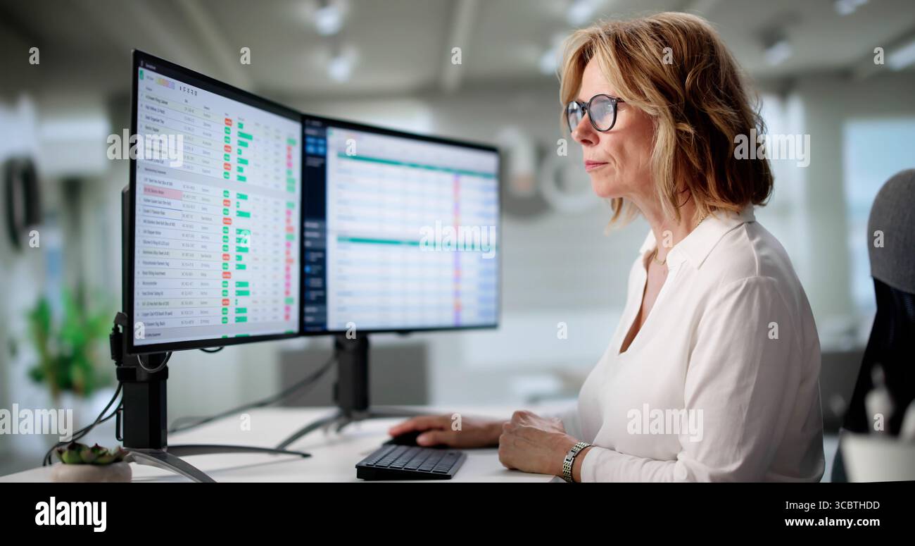 Female Accountant Analyzing Billing Discrepancies On Office Computer ...