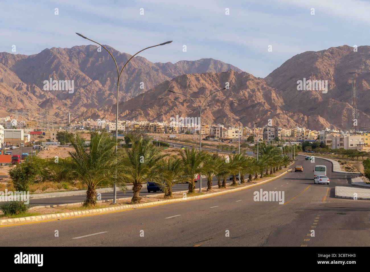 Scenic Highway 80 stretches from Aqaba, Jordan, toward rugged Middle ...
