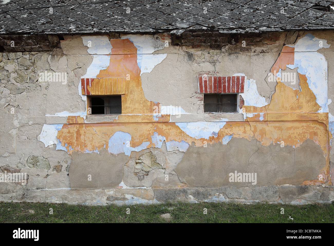 old house with two small windows Stock Photo - Alamy