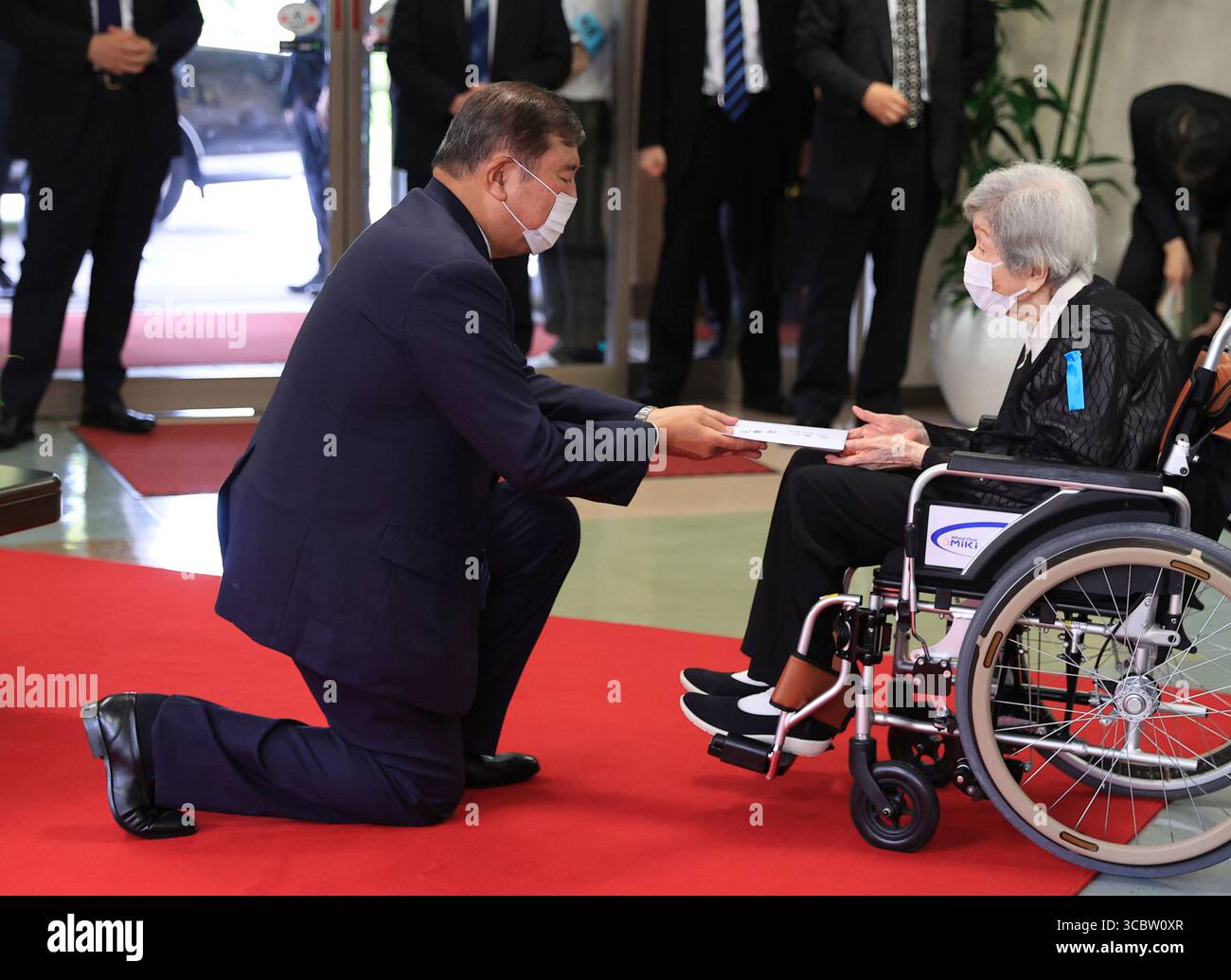 Japanese Prime Minister Shigeru Ishiba (L) visits Megumi-no-Oka ...