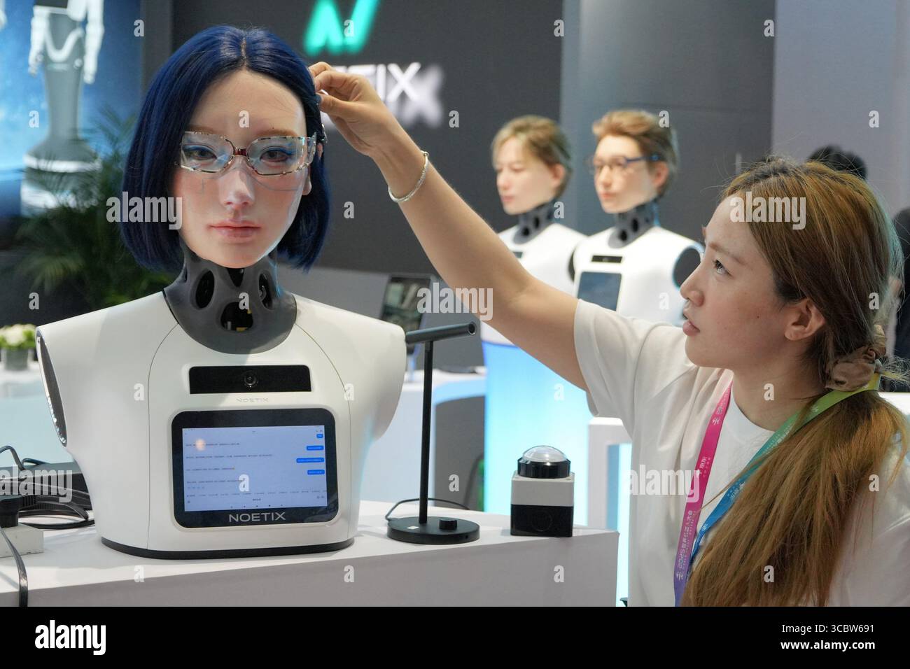 BEIJING, CHINA - AUGUST 8, 2025 - A staff member was styling the hair ...