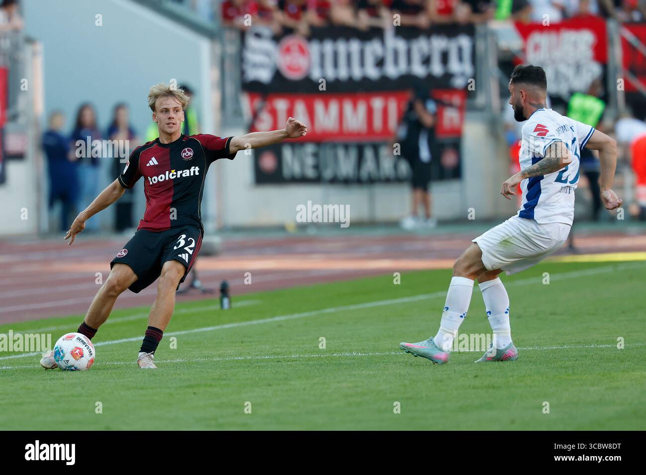Nuernberg, Ger. 08th Aug, 2025. v.l. Tim Janisch (1.FC Nuernberg, 32 ...