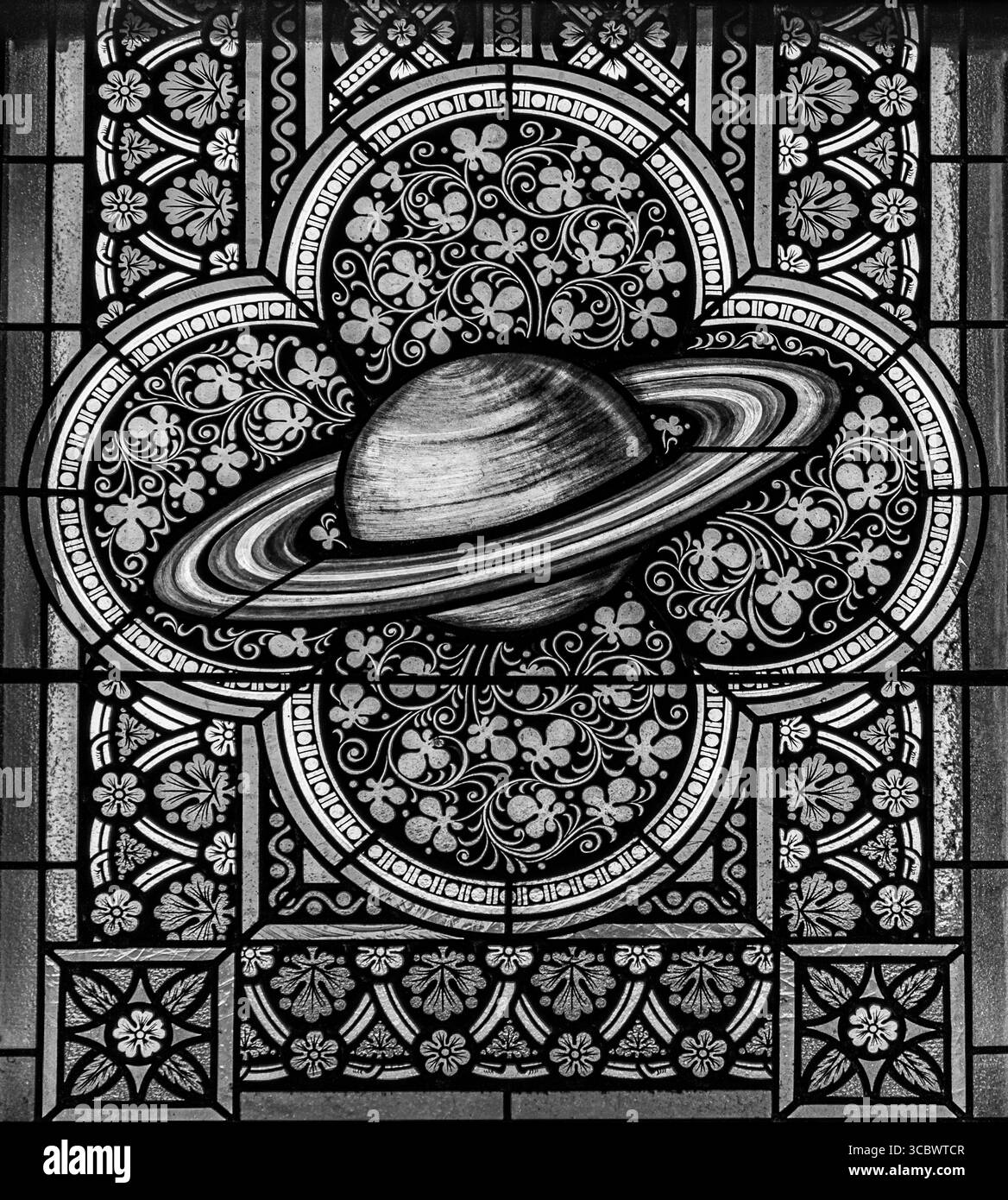 Cologne, North Rhine Westphalia, Germany - August 2018: Saturn, black and white stained glass ...