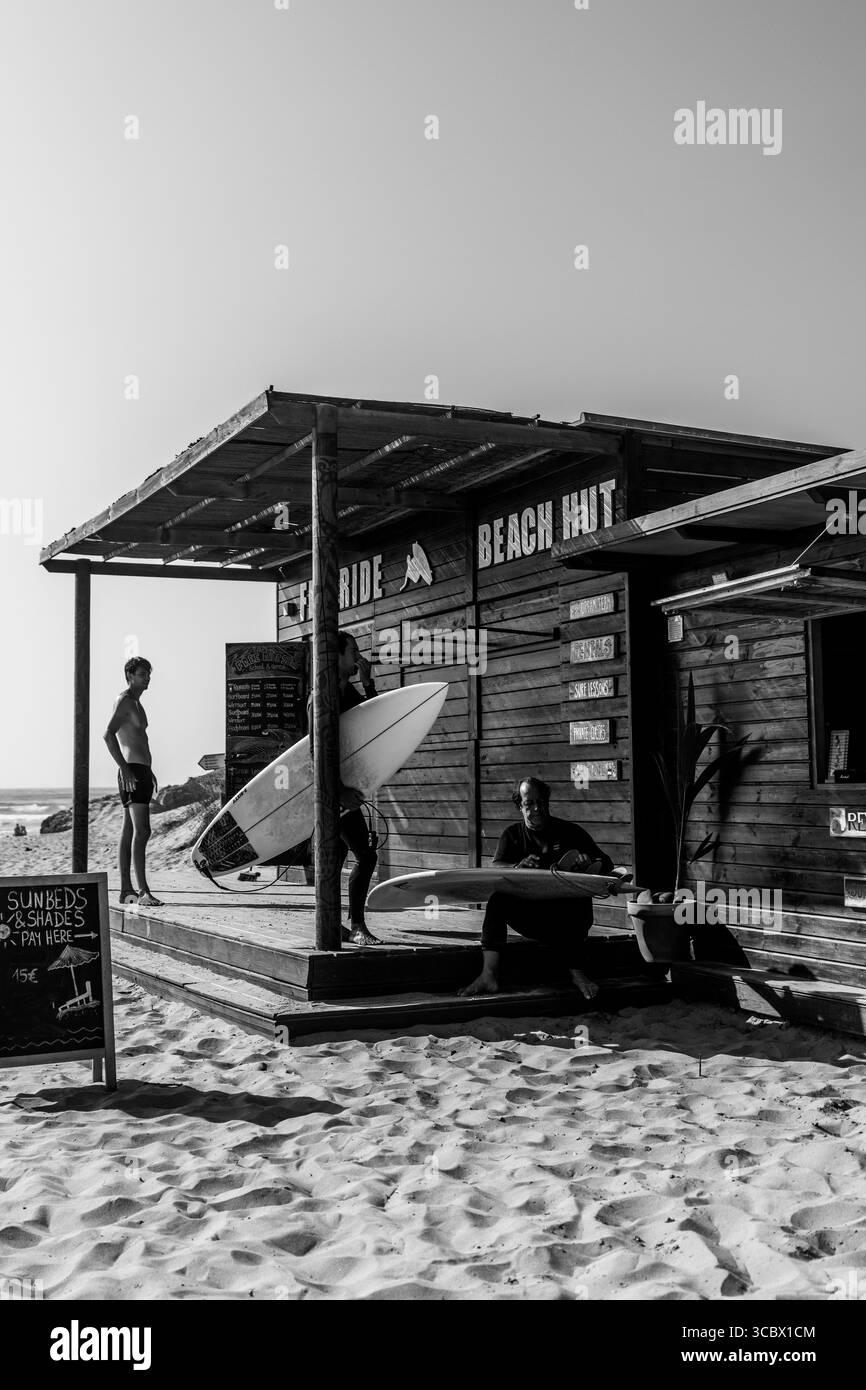Preparing the beach for summer with sand Black and White Stock Photos ...