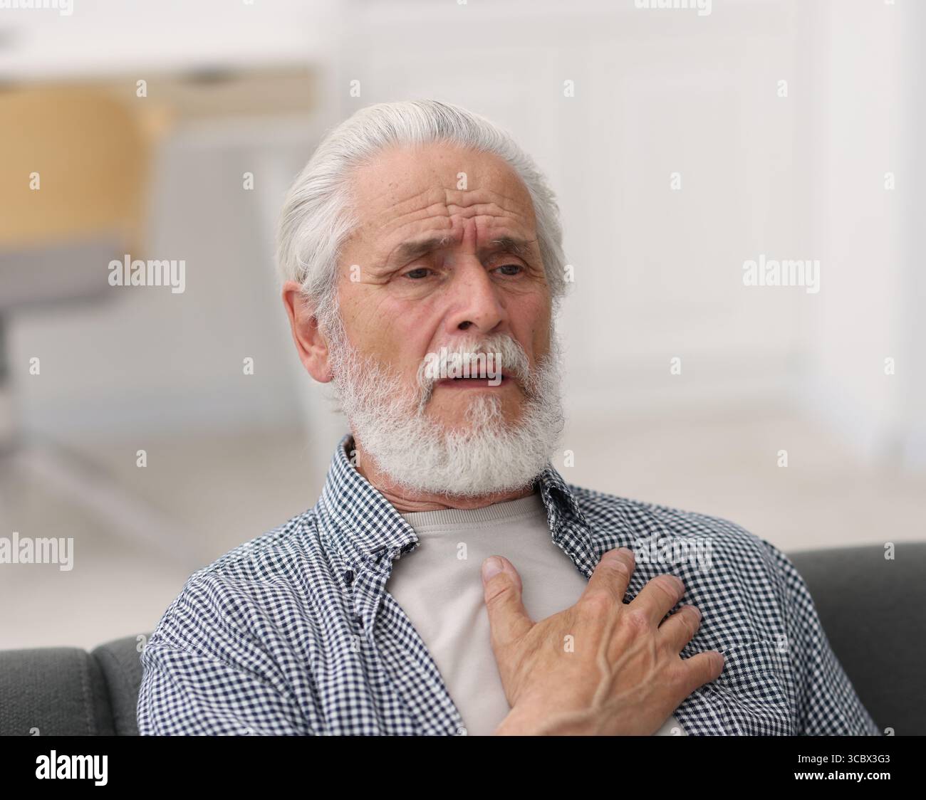 Suffering from heartache disease at home hi-res stock photography and ...