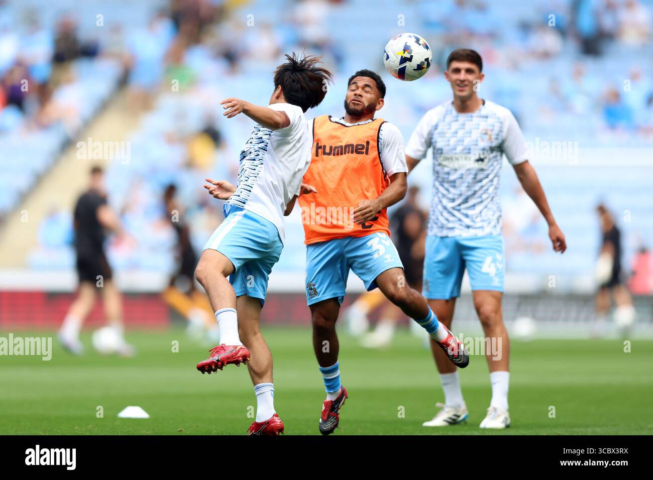 Coventry City's Tatsuhiro Sakamoto (left) and Coventry City's Jay ...