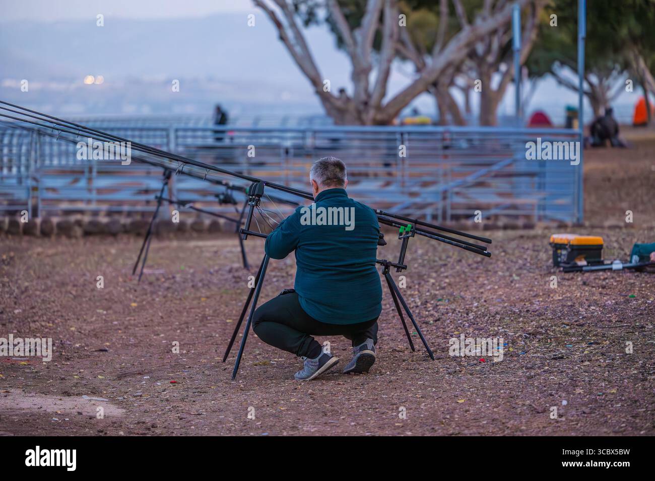 Angler preparing rods fishing lake hi-res stock photography and images ...