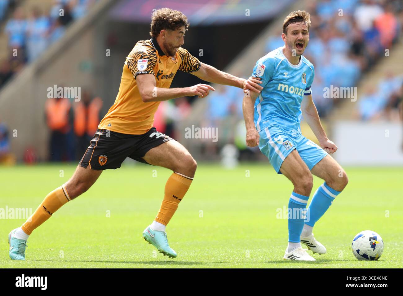 Hull City's Matt Crooks (left) and Coventry City's Liam Kitching battle ...