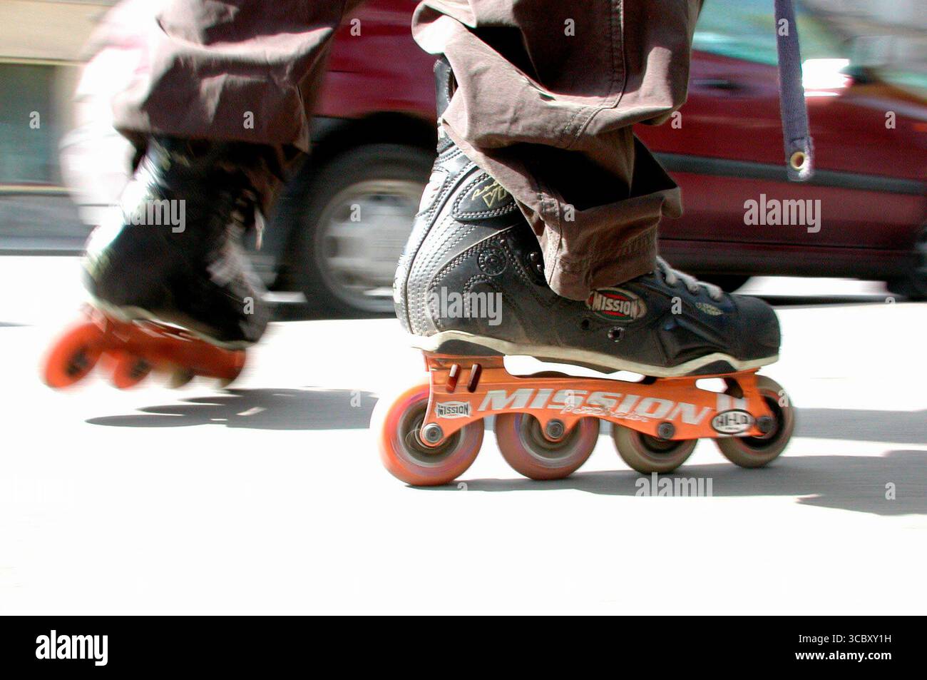 inline skating popular outdoor sport on the street and in the park ...
