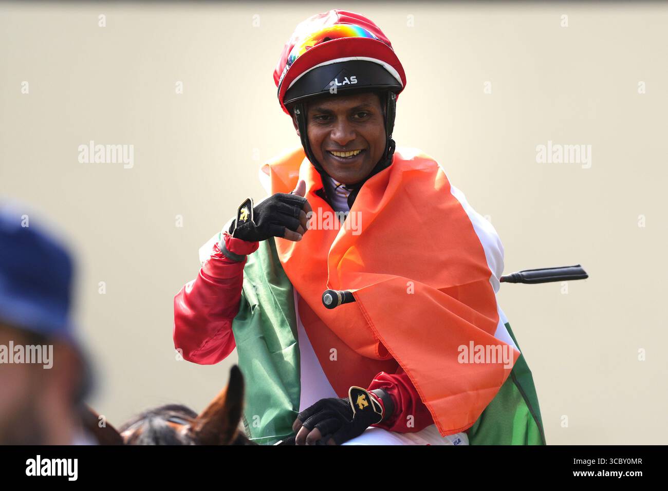 Team Asia jockey Suraj Narredu celebrates after winning the Dubai Duty ...