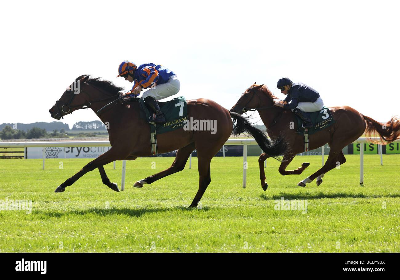 Diamond Necklace ridden by Wayne Lordan (left) coming home to win the Grand Hotel Malahide Irish ...