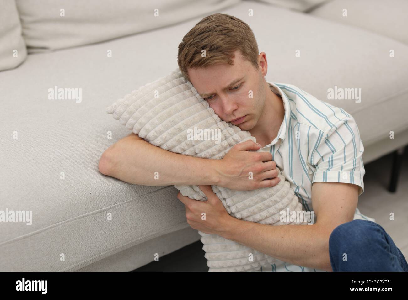 Sad tired man pillow hi-res stock photography and images - Alamy