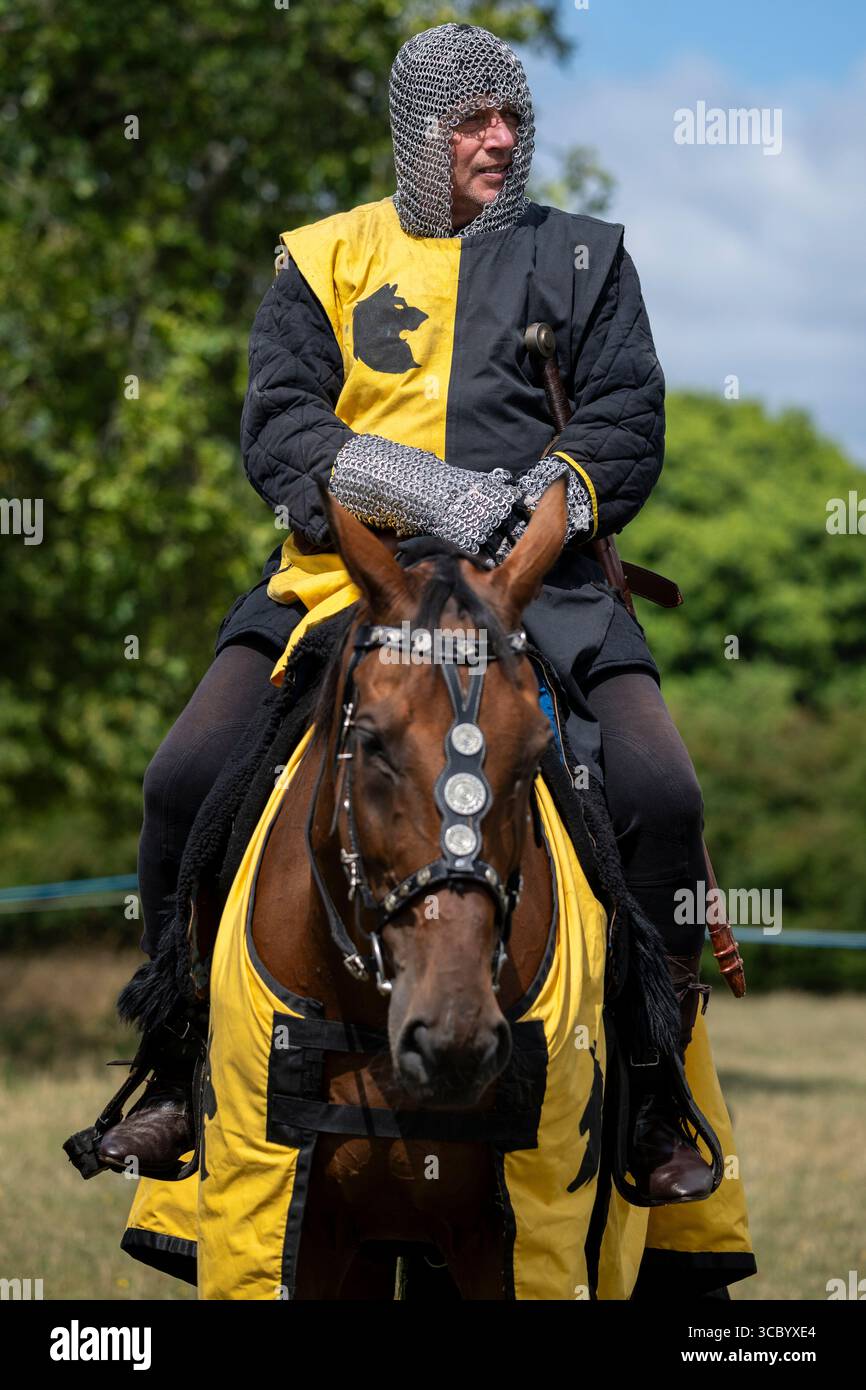 Chalfont, UK. 9 August 2025. A re enactor during a medieval warhorses ...