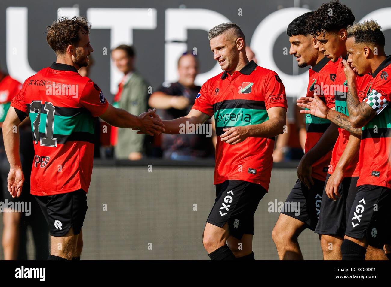 NIJMEGEN - Bryan Linssen of NEC Nijmegen (c) receives congratulations ...