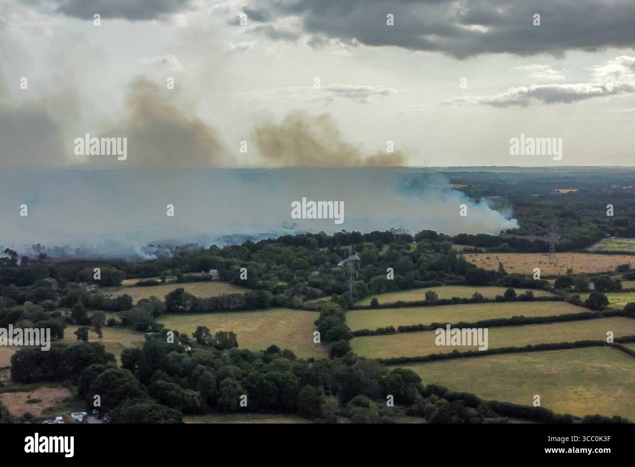 Holt, Dorset, UK. 9th August 2025. UK Weather. Aerial view towards the ...