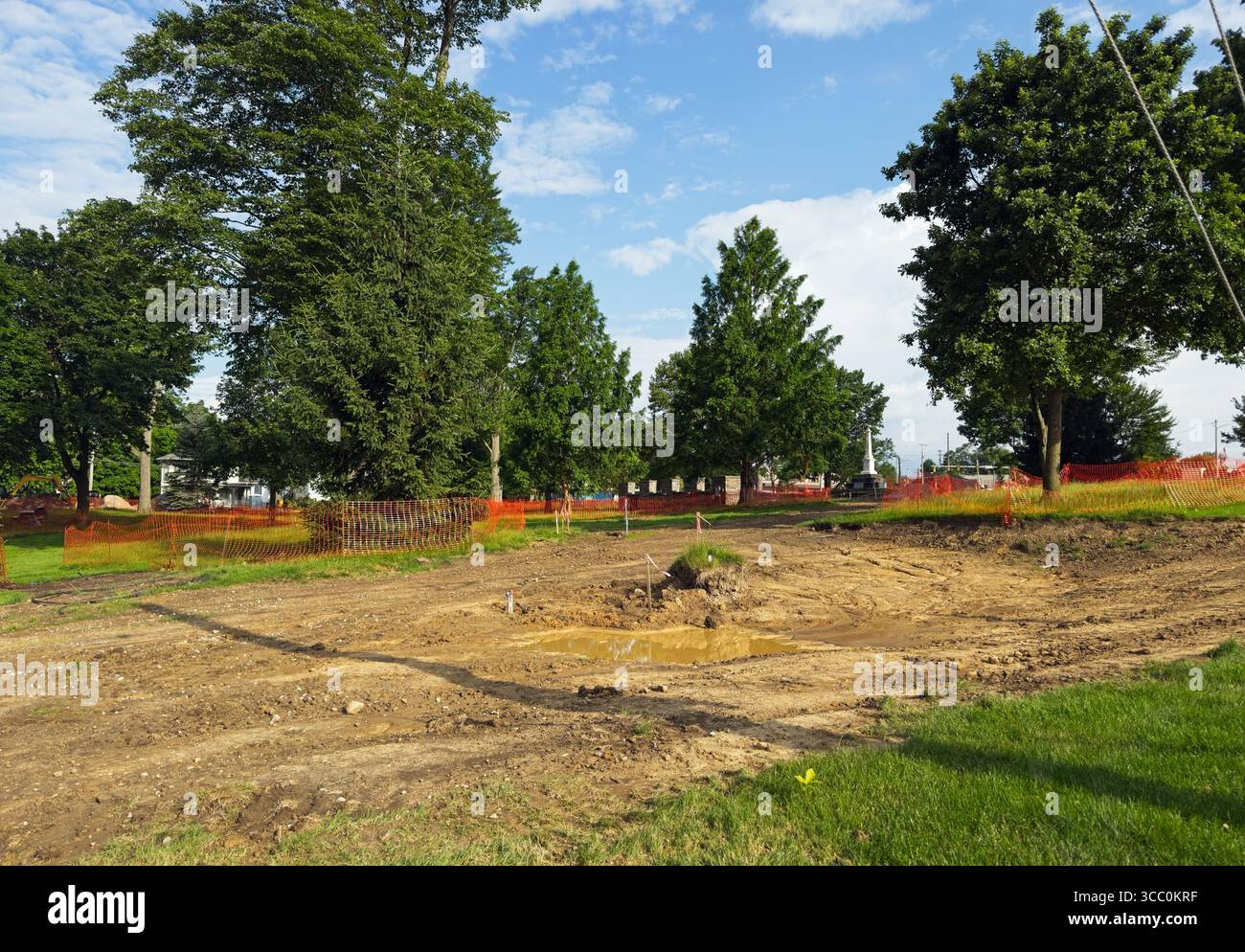 A massive scar of mud on the town square in Twinsburg Ohio points to ...