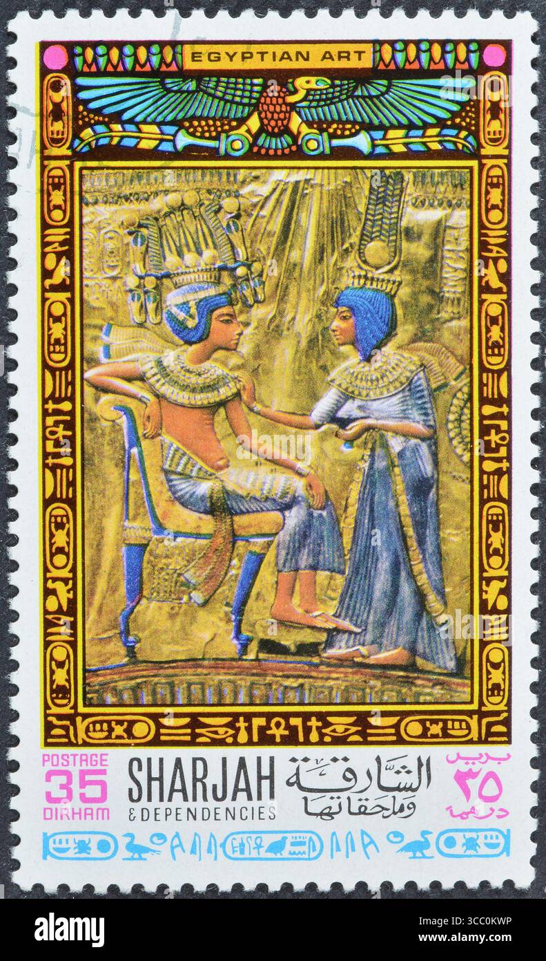 Cancelled postage stamp printed by Sharjah, that shows Tutankhamun ...