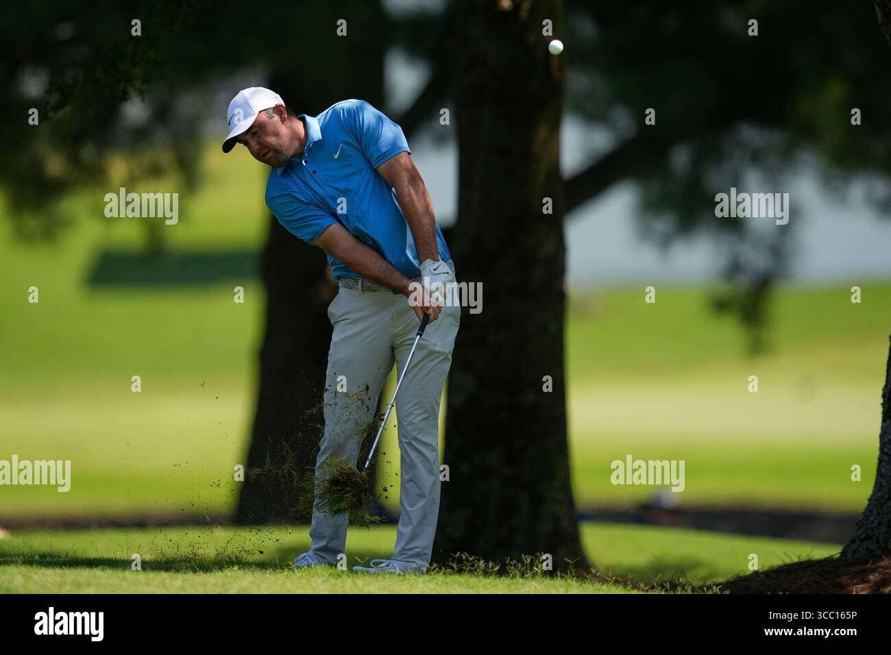 Scottie Scheffler hits to the first green during the third round of the ...