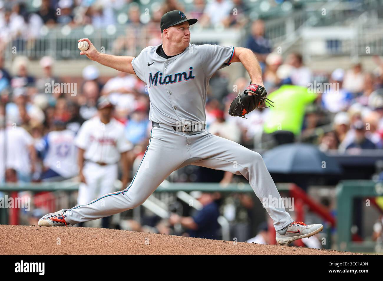 Miami Marlins pitcher Ryan Gusto delivers in the third inning of a ...