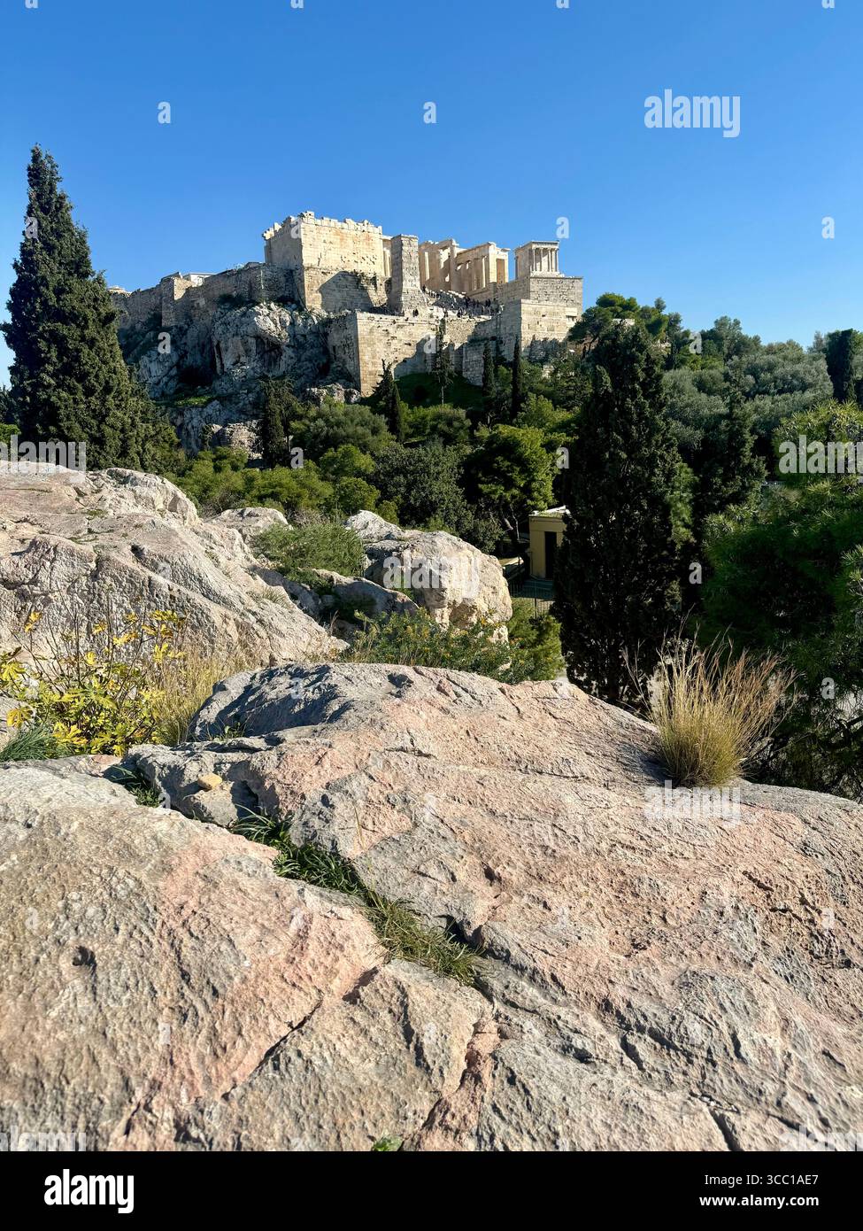 The Acropolis of Athens under clear blue skies, Greece Stock Photo - Alamy