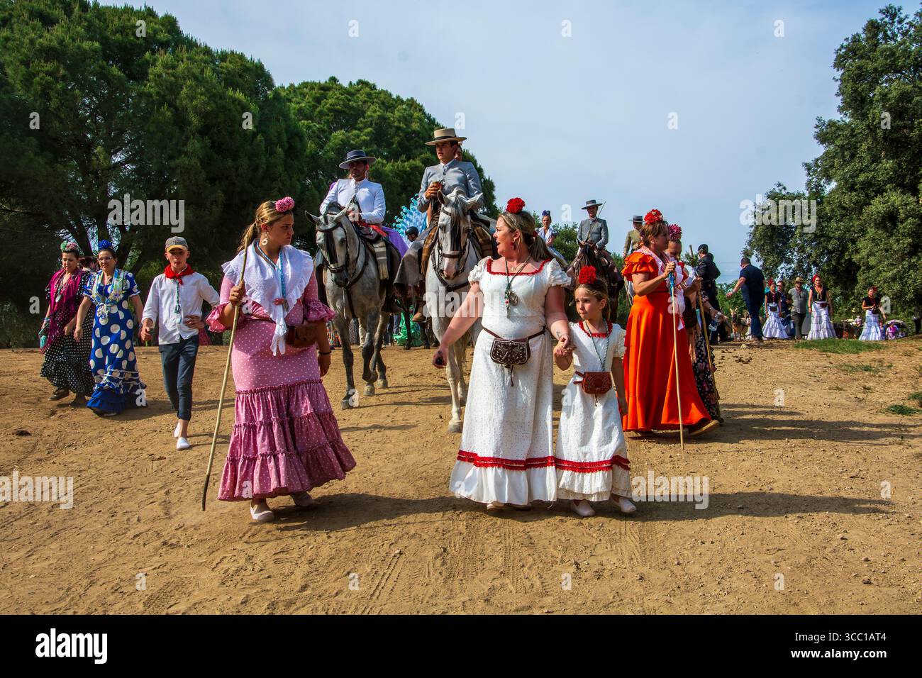 Huelva, Andalusia, Spain. 4 June 2025. Pilgrims walking along the dirt ...