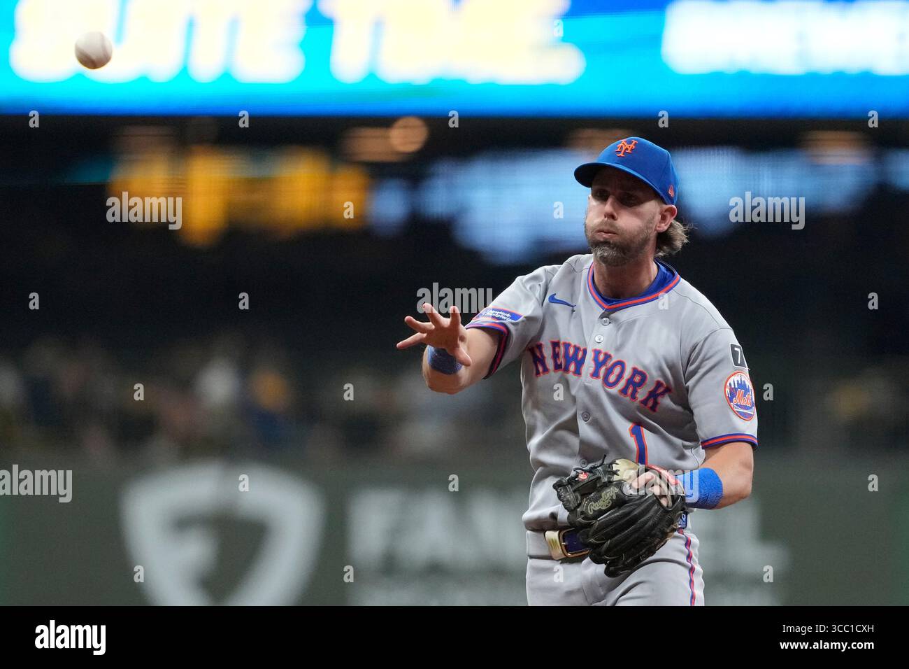New York Mets' Jeff McNeil throws to first base during a baseball game ...