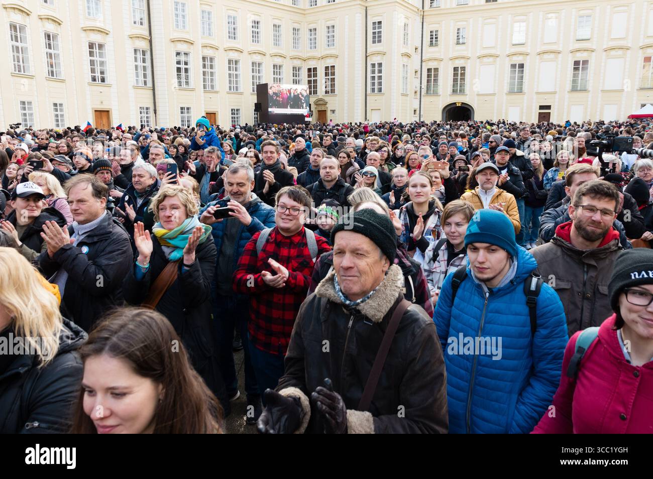 Crowd at the 4rd courtyard of Prague Castle watching the inauguration ...