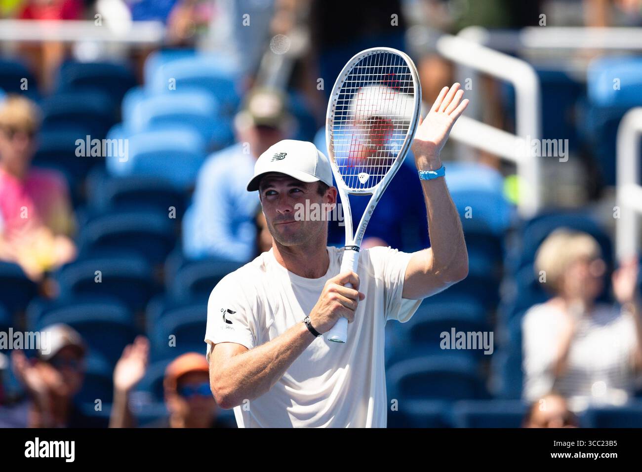MASON, OHIO - AUGUST 09: Tommy Paul of USA waves to the crowd on Day 3 ...
