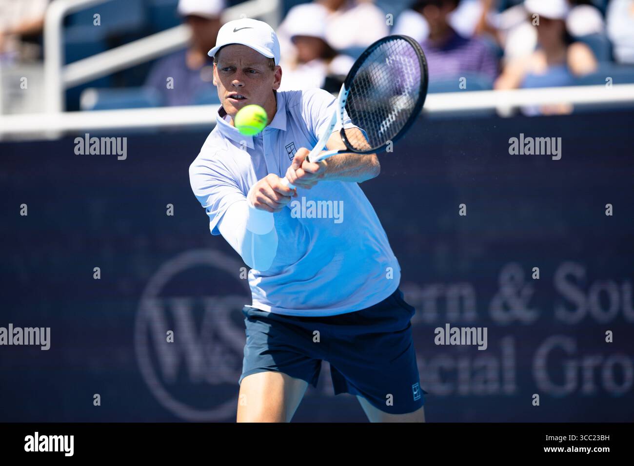 MASON, OHIO - AUGUST 09: Jannik Sinner of Italy hits a backhand during ...