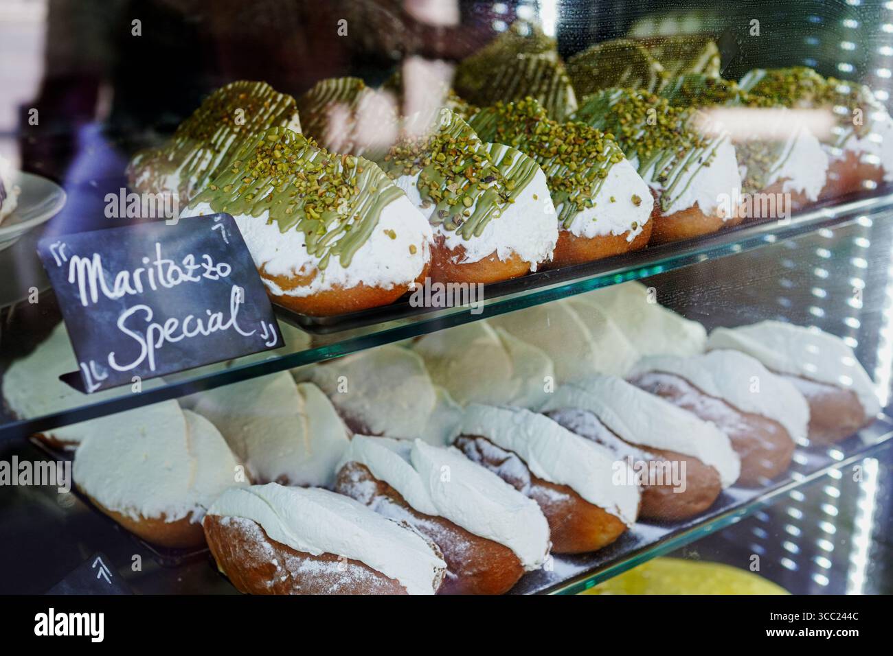 Roman Specialty Sweets maritozzo and maritozzo with pistachio cream in ...