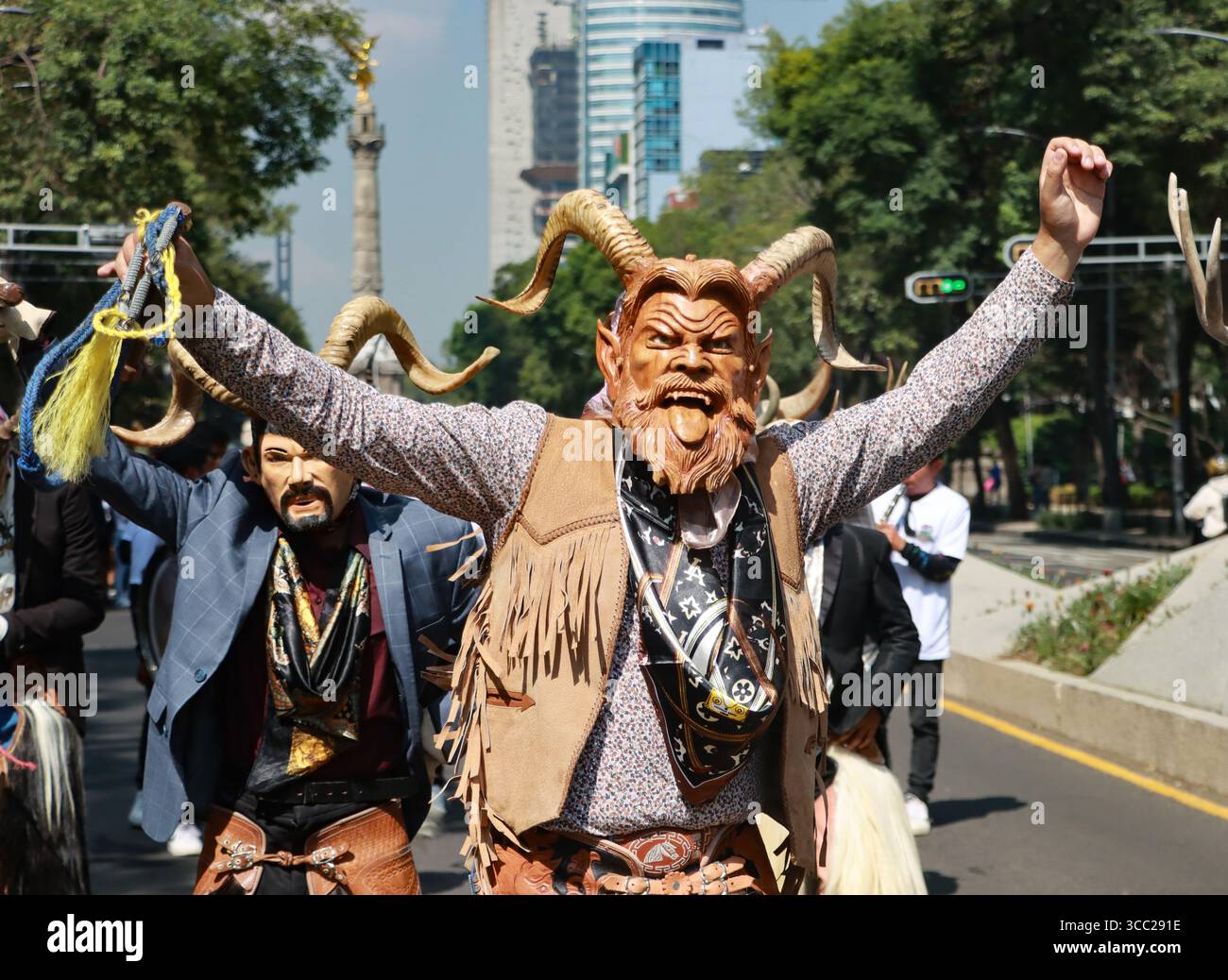 A person disguised as devil takes part during the 2025 Mega Calenda ...