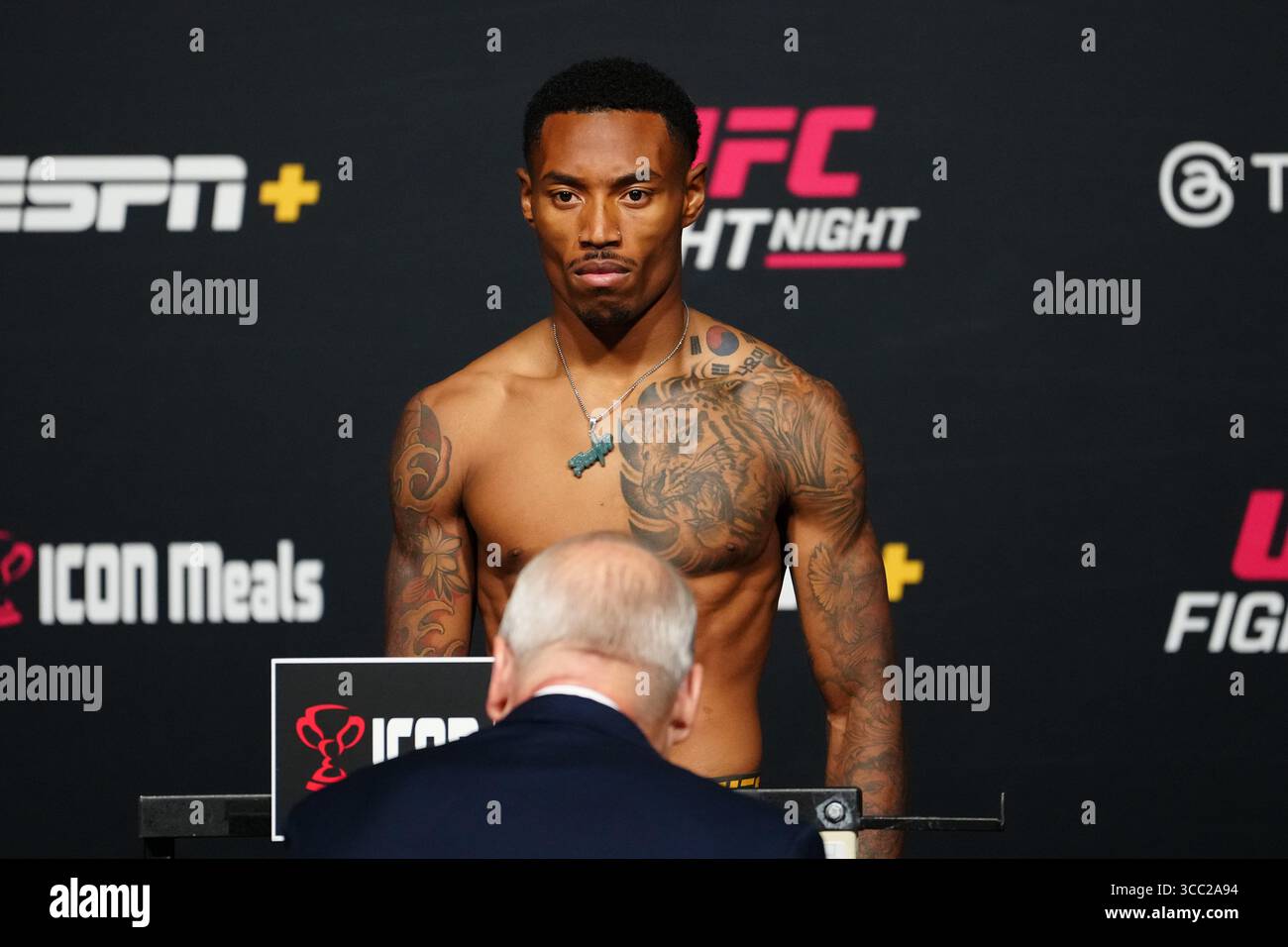 LAS VEGAS, NV - AUG 8: Elijah Smith steps on the scale for the official ...