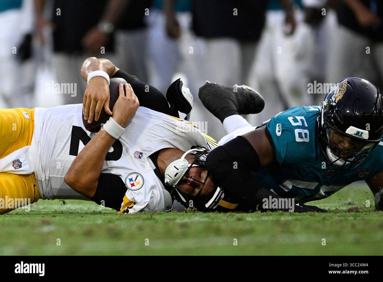 Pittsburgh Steelers quarterback Mason Rudolph (2) is sacked by ...