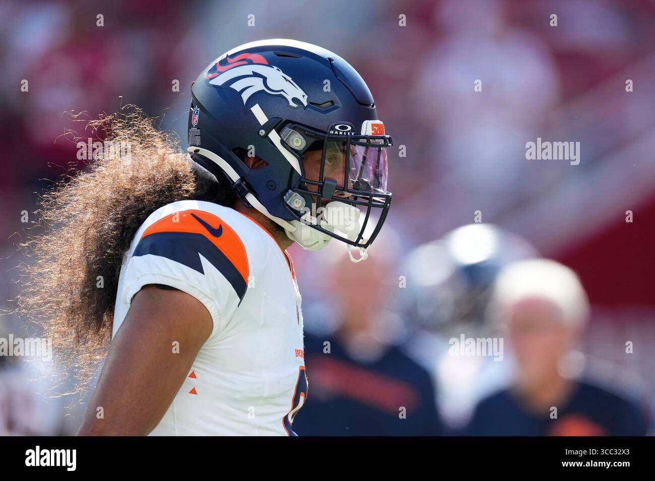 Denver Broncos safety Talanoa Hufanga warms up before a preseason NFL ...