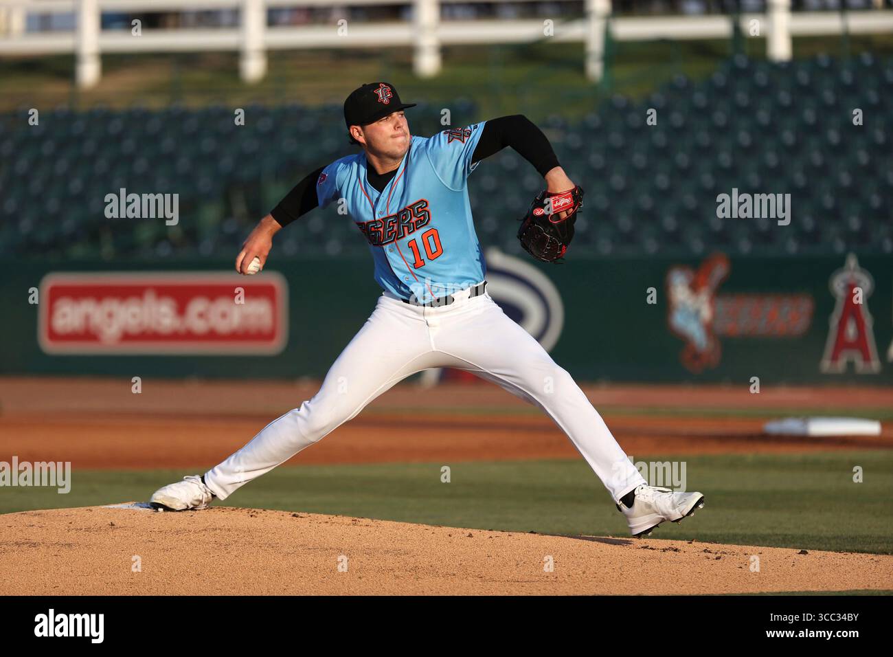 Barrett Kent (10) of the Inland Empire 66ers pitches against the Fresno ...