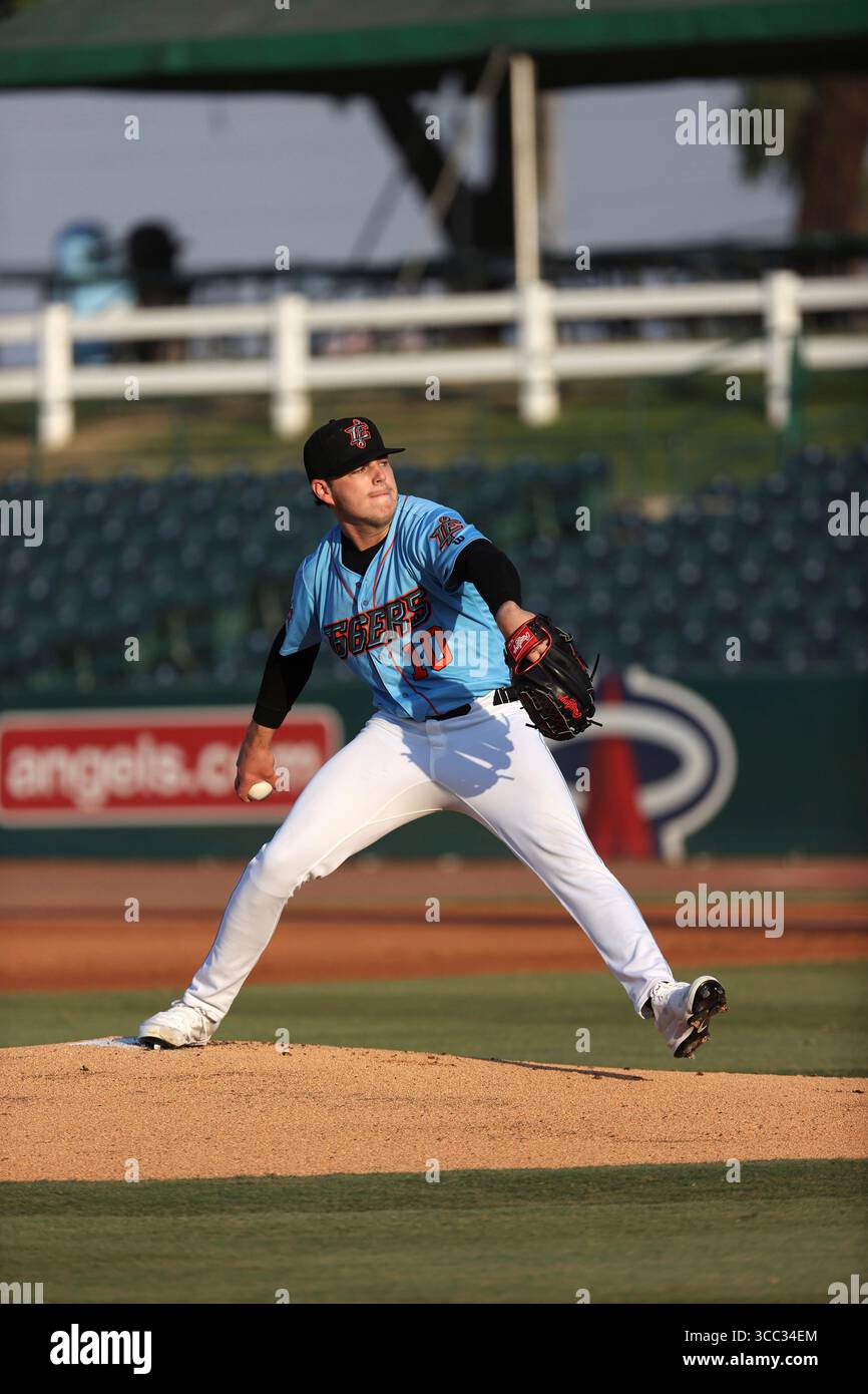 Barrett Kent (10) of the Inland Empire 66ers pitches against the Fresno ...