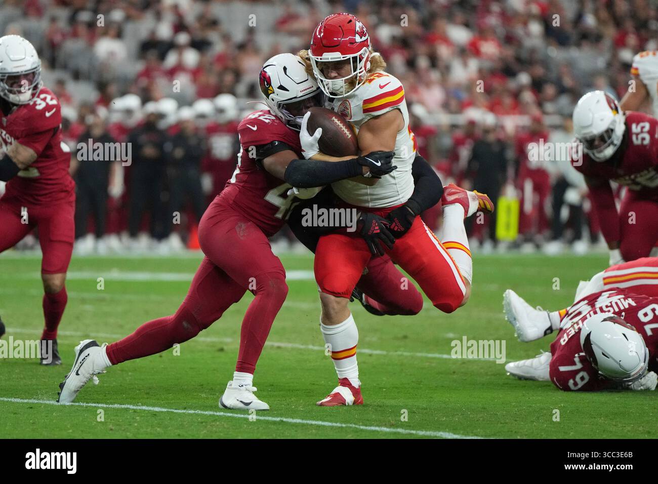 Arizona Cardinals safety Dadrion Taylor-Demerson, left, tackles Kansas ...