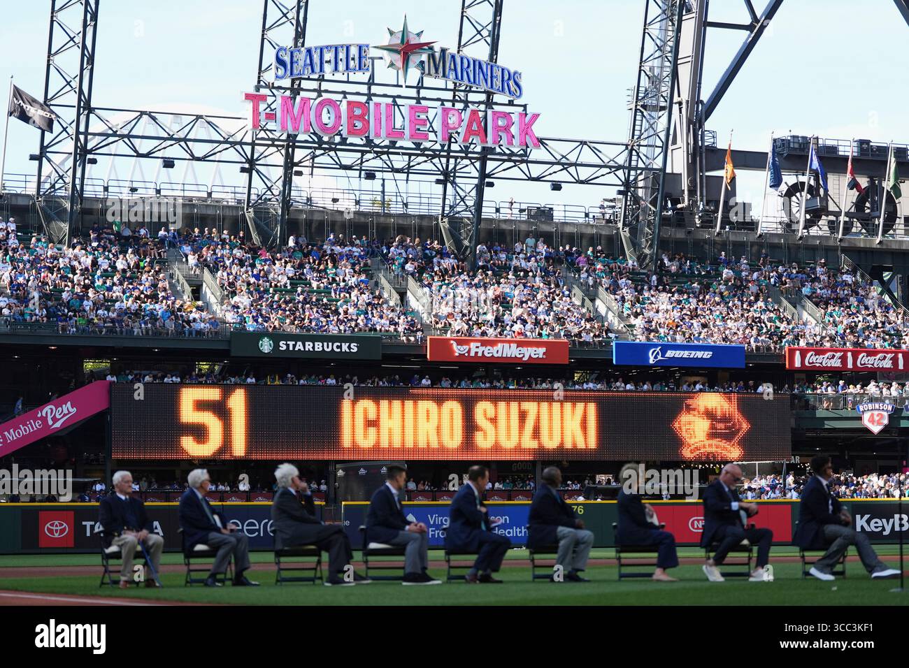 Fans watch former Seattle Mariners right fielder Ichiro Suzuki's jersey ...