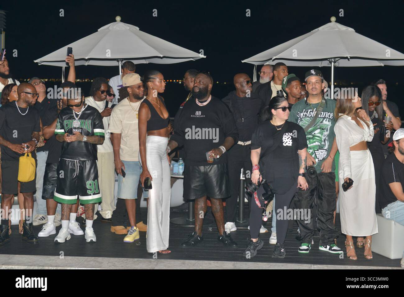 HOLLYWOOD, FLORIDA - AUGUST 08: Young Ma, Rick Ross and girlfriend ...
