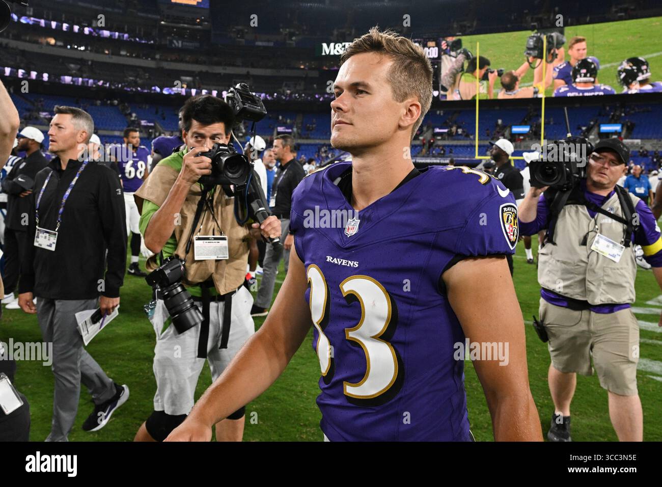 Baltimore Ravens place kicker Tyler Loop (33) looks on after an NFL ...