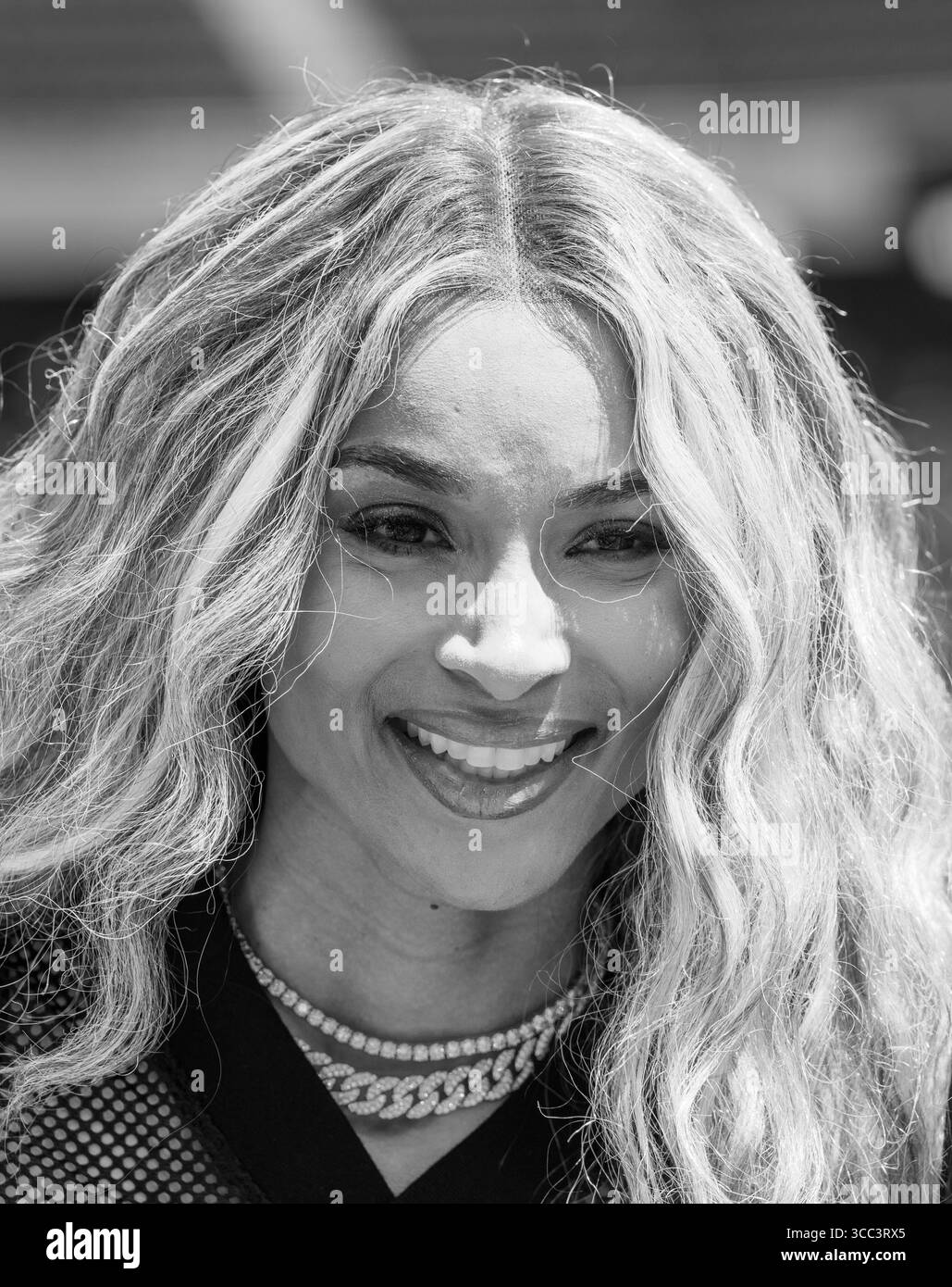 Harrison, NJ, August 9, 2025: Ciara performs as torch lighter before ...