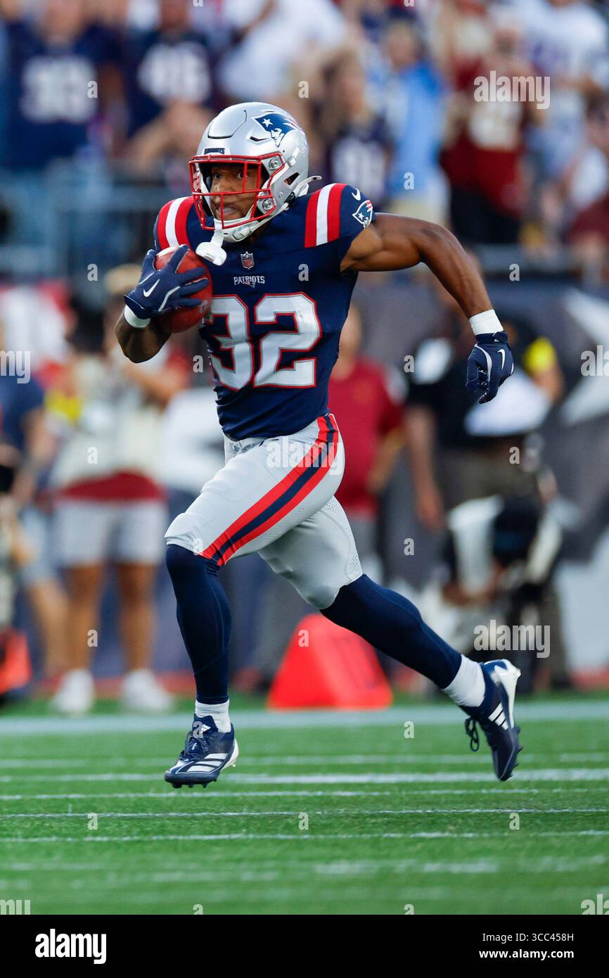 New England Patriots TreVeyon Henderson (32) carries the ball for a run ...