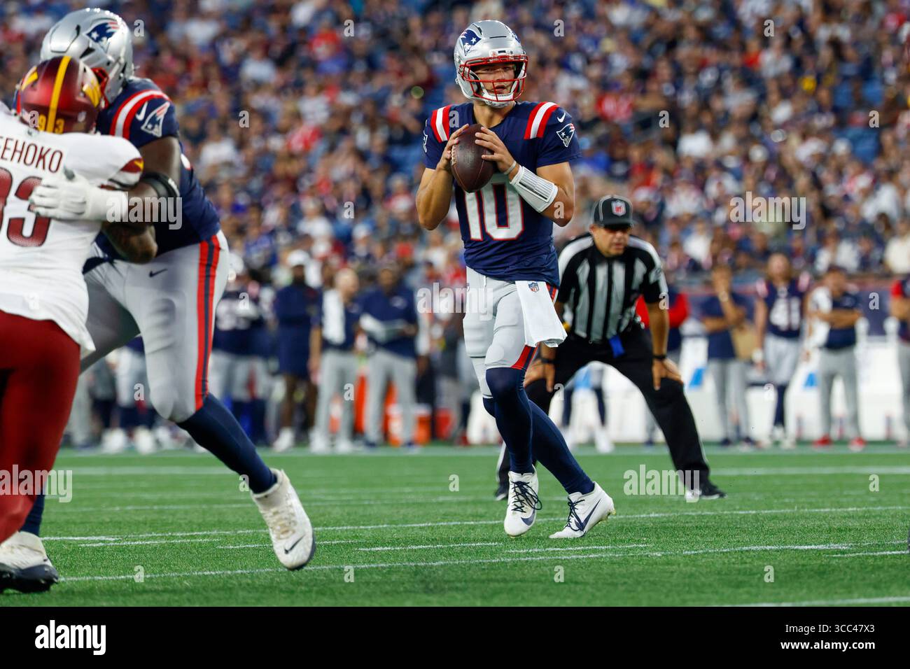 New England Patriots quarterback Drake Maye (10) drops back to make a ...