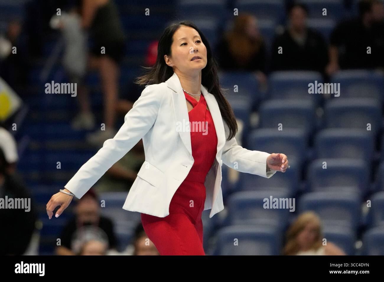 USA Gymnastics president Li Li Leung walks on stage after the senior ...